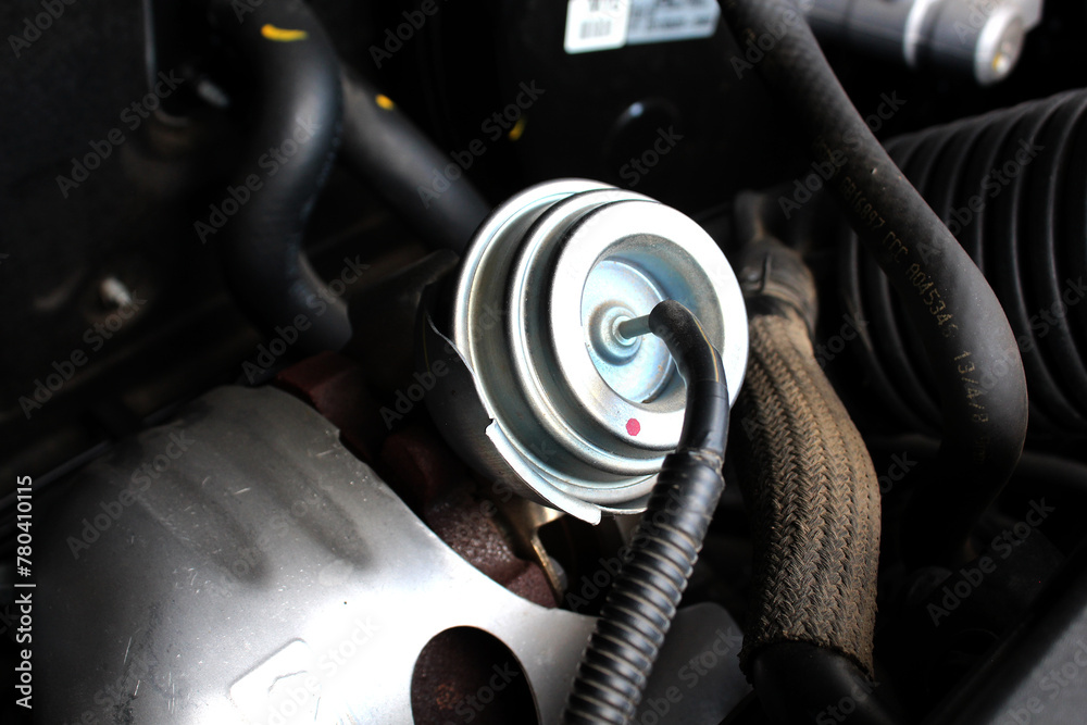 Engine turbine vacuum valve. Engine vacuum actuator. Close up engine ...