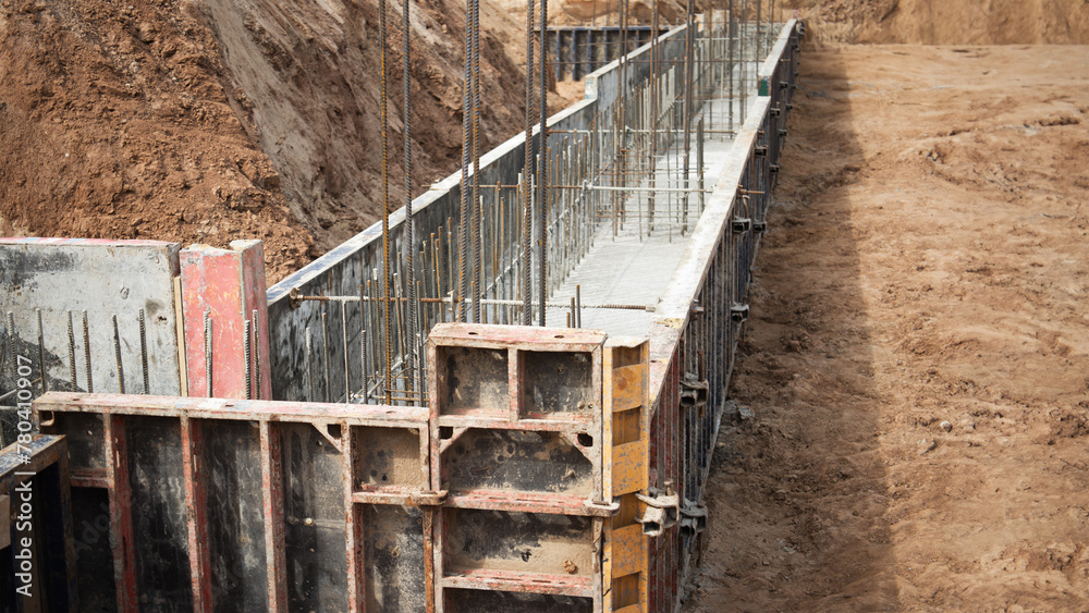 Building strong foundations with reinforced concrete and steel bars at ...