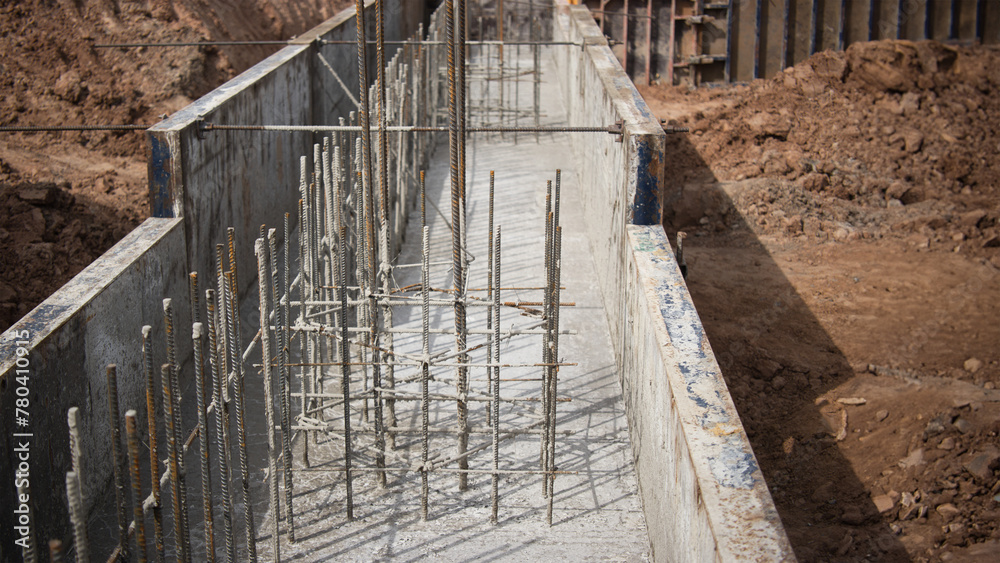 Building strong foundations with reinforced concrete and steel bars at ...