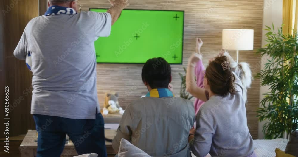 Back view of a group of friends or a big family celebrating a victory ...