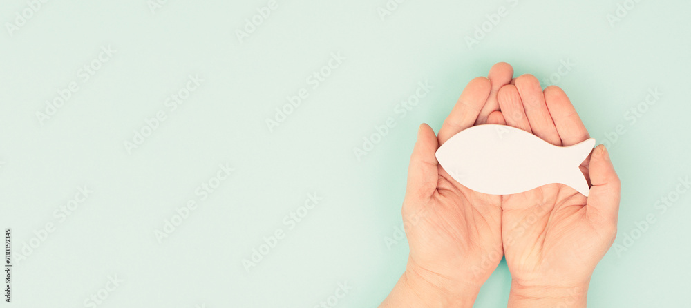 Confirmation, communion and baptism, hand holding fish, religious ...