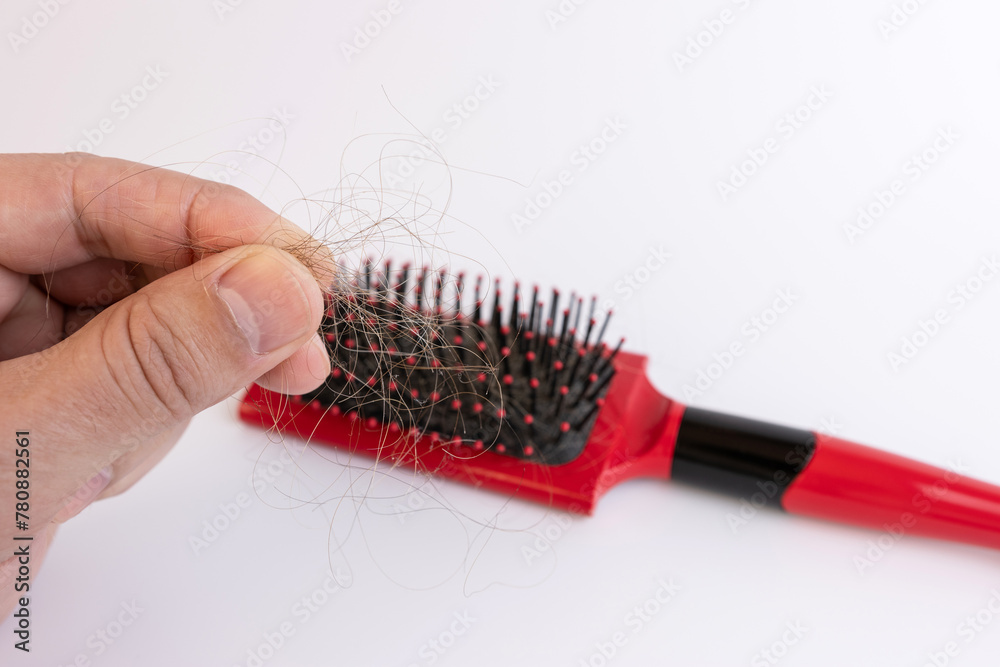 Hair got stuck in the comb. Hair problem concept. Brittle and split ...