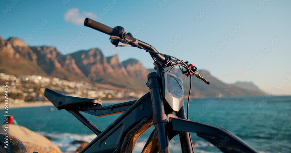 Beach, sky and electric motorcycle for transport, adventure and ...
