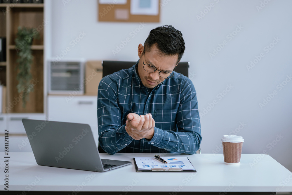 Businessman have wrist pain after work hard in office feeling so pain ...
