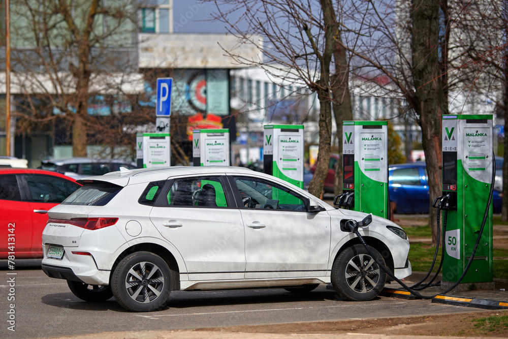 Minsk, Belarus. Mar 31, 2024. White BYD E2 at charge station. Parked ...