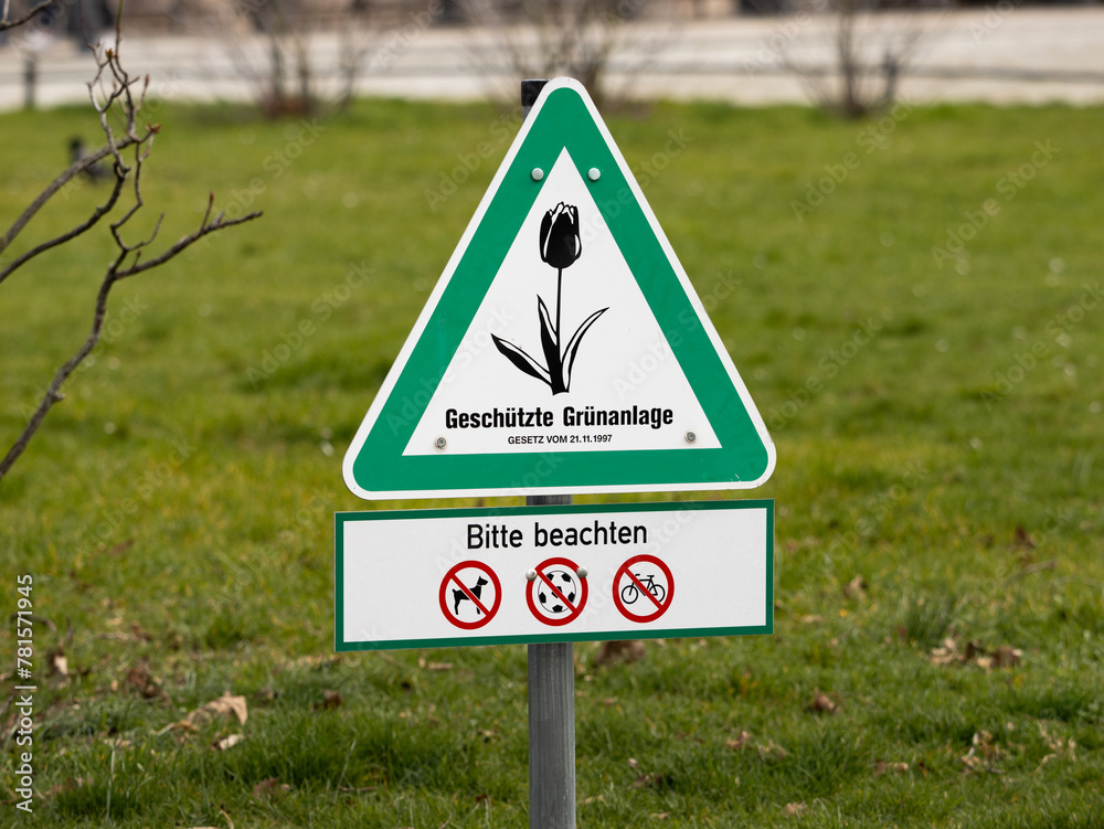 Geschützte Grünanlage (protected area) sign of a public park in Berlin ...