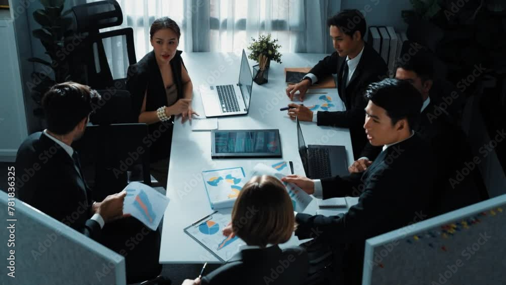 Top view of smart executive manager financial graph to diverse team ...