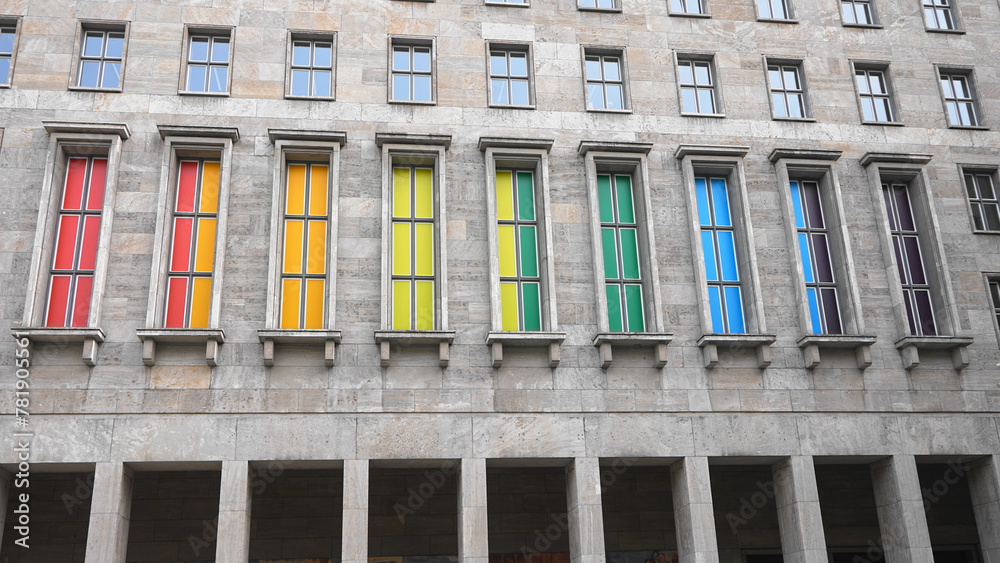Colorful bi symbol hang finance ministry window. Vivid rainbow flag ...
