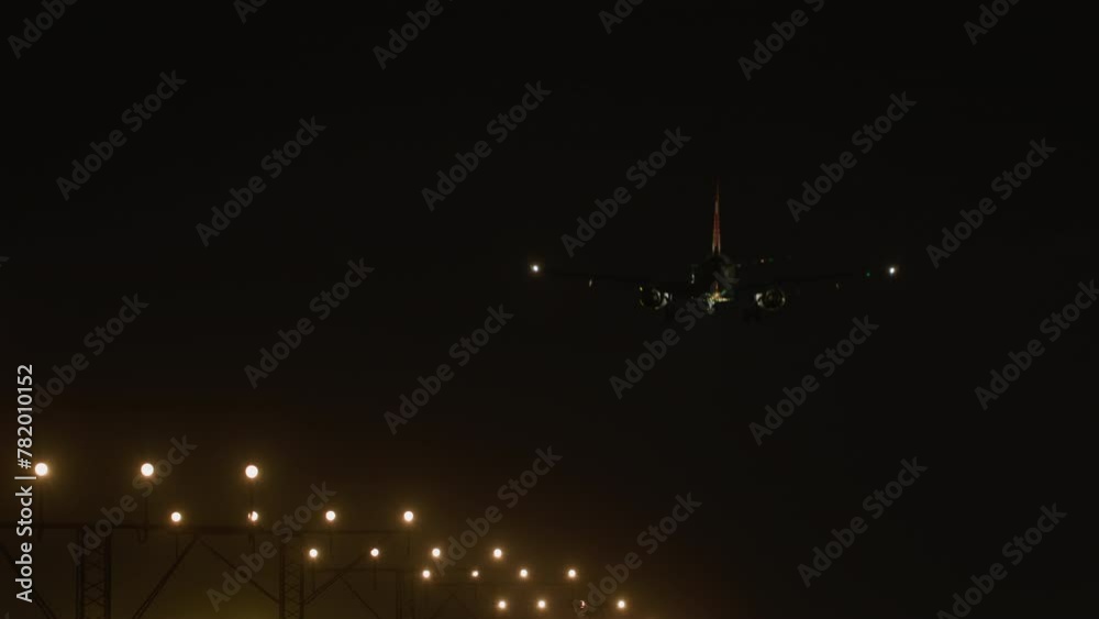Airplane with landing lights on, aligned for runway approach, clear ...