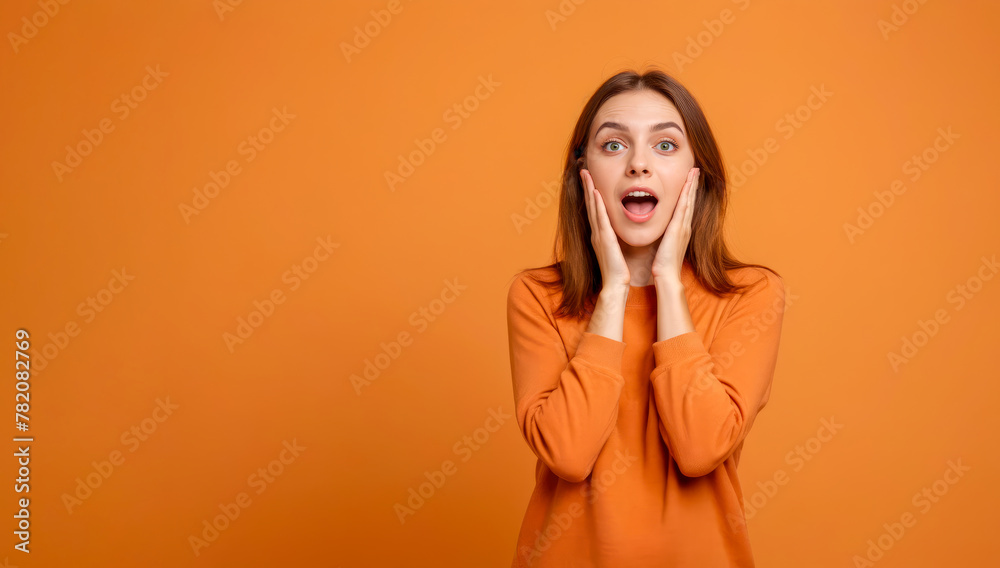 surprised young woman, palms to face, emotion of pleasant surprise and ...