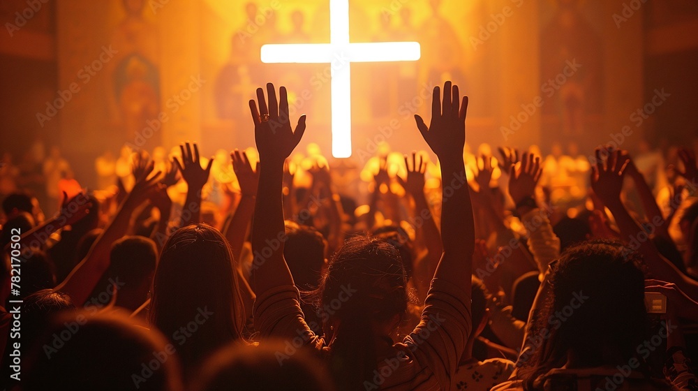 christian worshipers raising hands up in front of the cross church ...