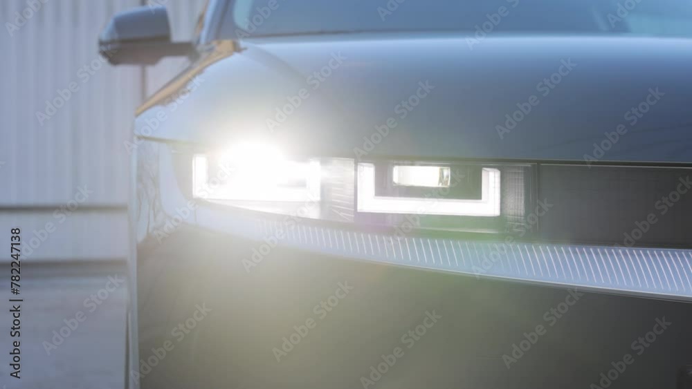 Vídeo do Stock: Switched on led matrix lights of luxury car. Car front ...