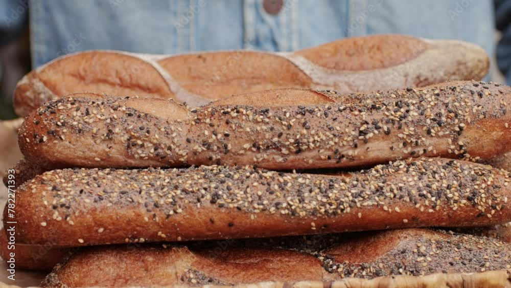 Fresh Artezan bread close-up. Artisan bread is making by skill bakers ...