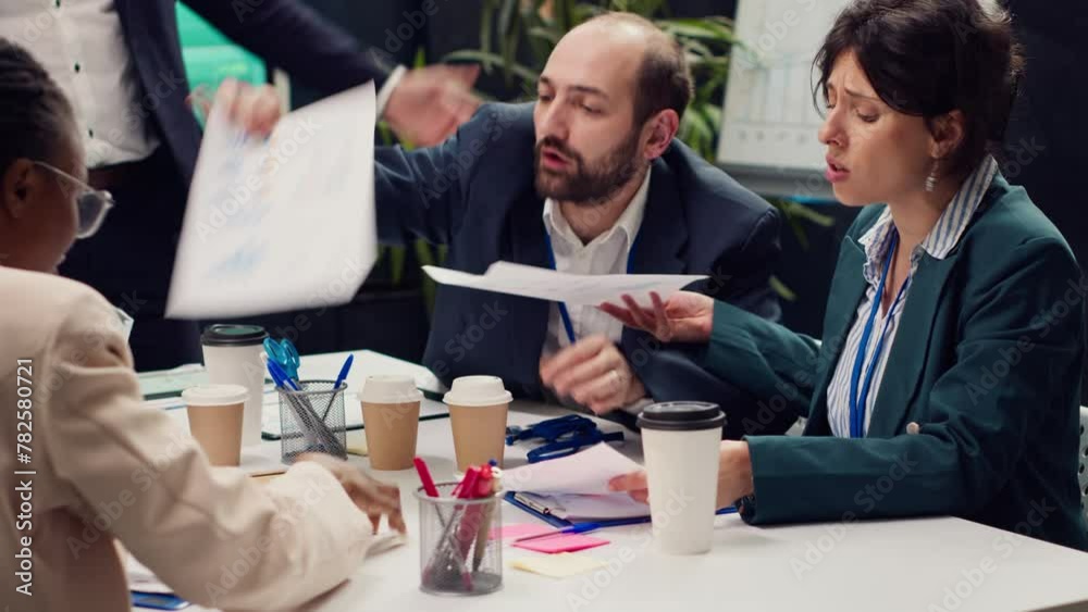 Frustrated business team working under pressure to meet project ...