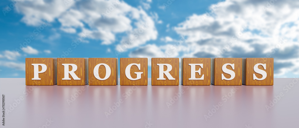 Progress. Wooden dices with white capital letters and the word ...