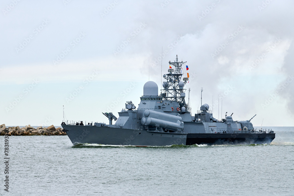 Russian warship armed with armament sails into sea toward military ...
