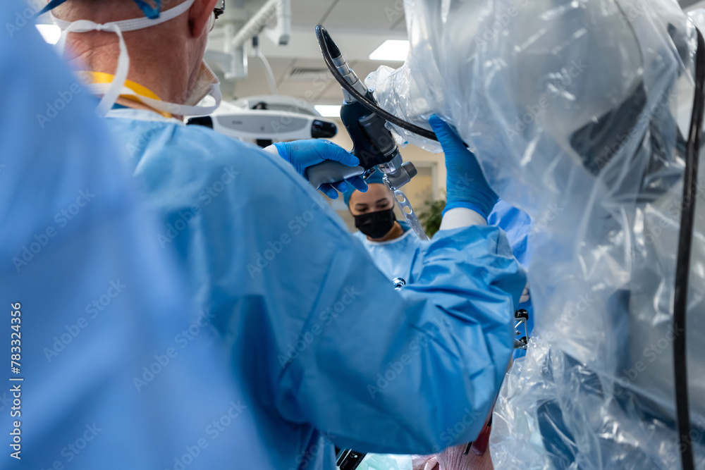 Team of doctor perform total hip arthroplasty replacement surgery in ...