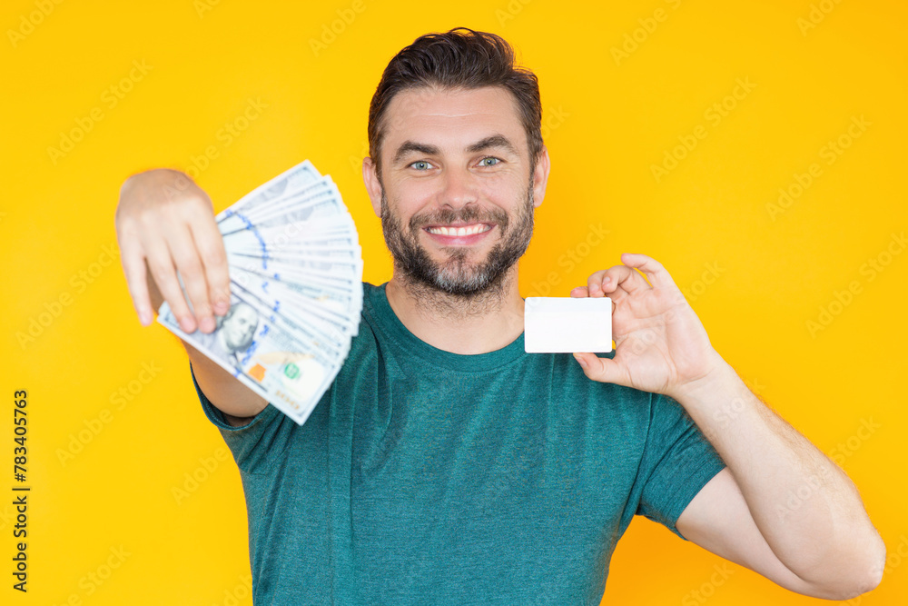 Rich man holding cash dollar bills on yellow studio. Big luck, banner ...