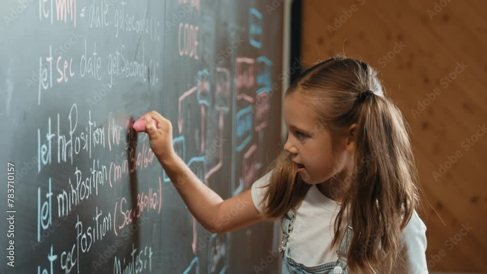 Panorama shot of girl writing engineering prompt on blackboard ...