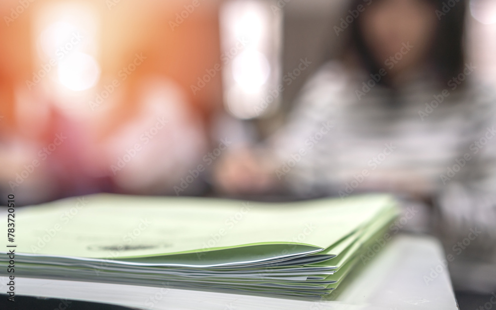 Exam answer sheet pile, blurry application document paperwork stack on ...
