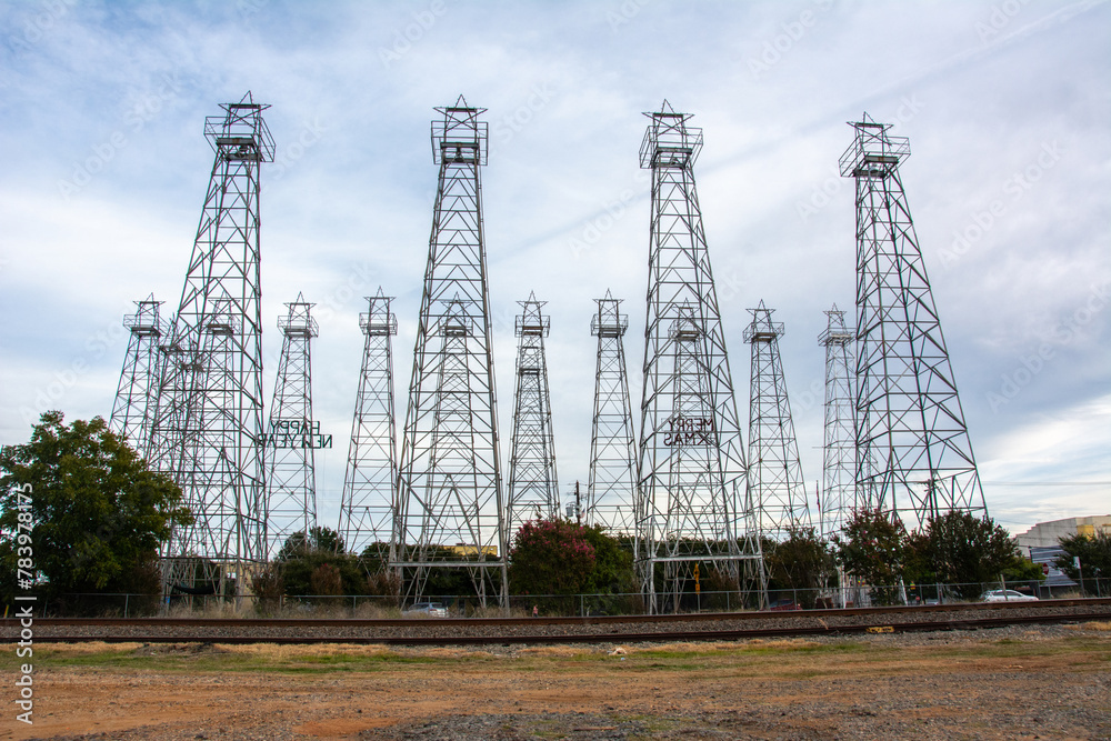 Iron oil derricks in the World's Richest Acre Park in downtown Kilgore ...
