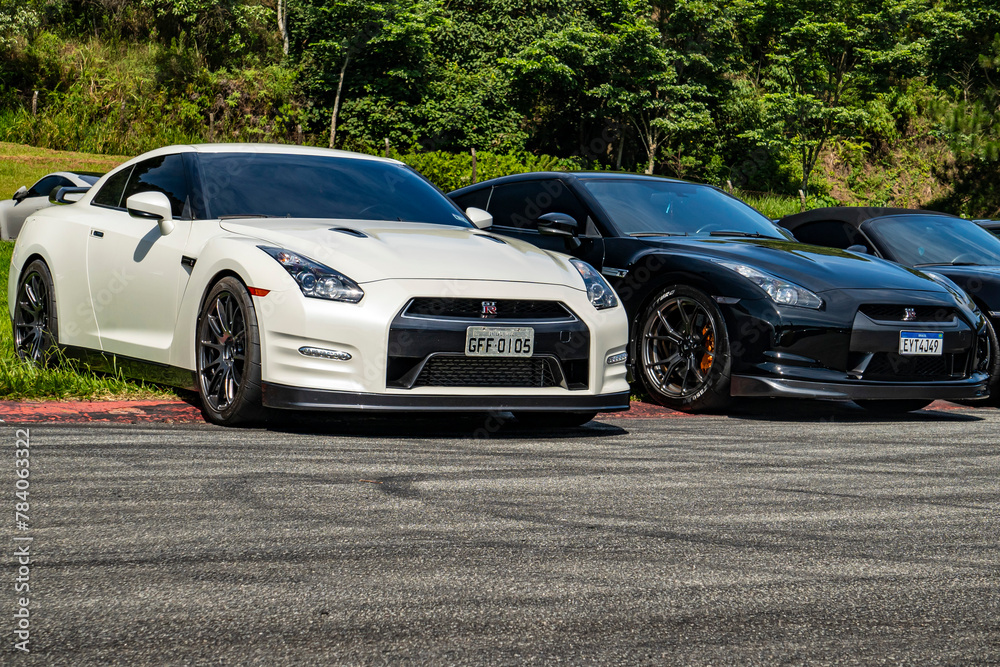 Black and white Nissan GTR R35 - Two JDM Sportscar parked side by side ...