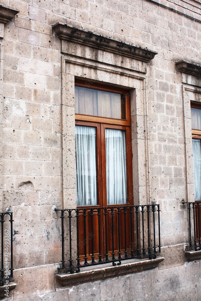 Colonial style window. Rustic. Exterior wooden and ironwork window ...