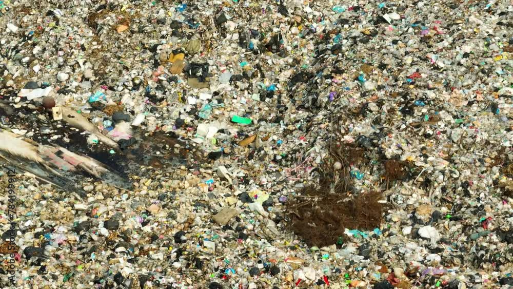 A chaotic mix of trash with varied textures and colors, highlighting ...