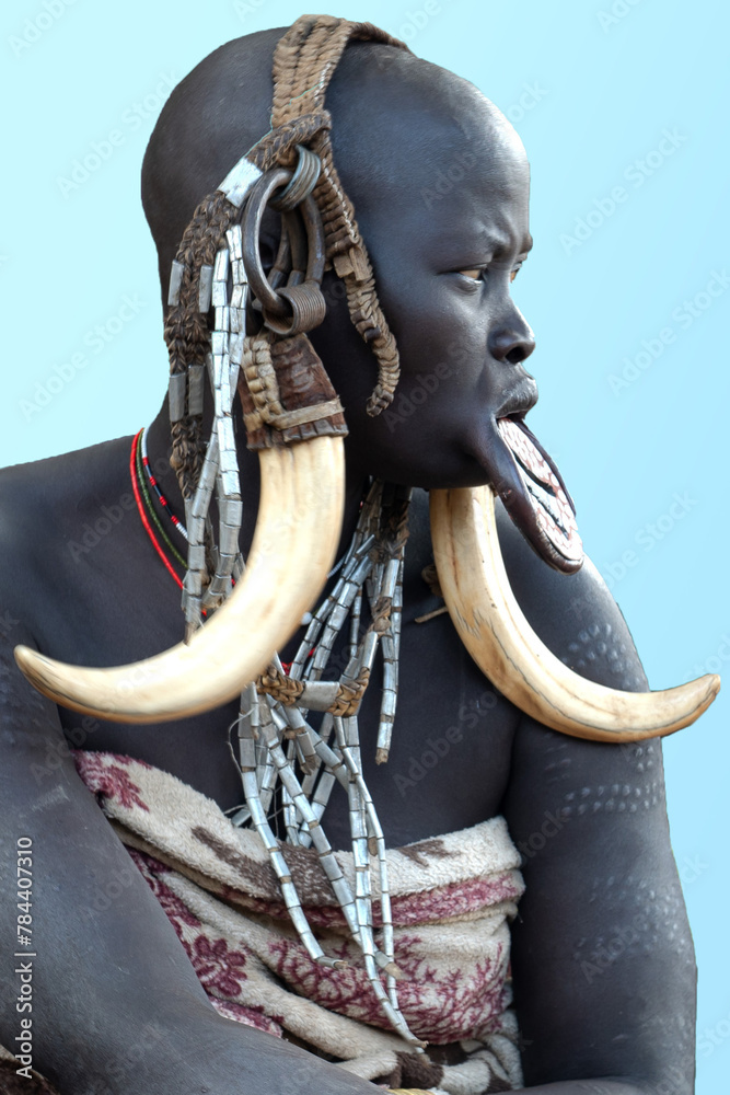 Ethiopia, a woman from the Mursi tribe with beautiful head decoration ...