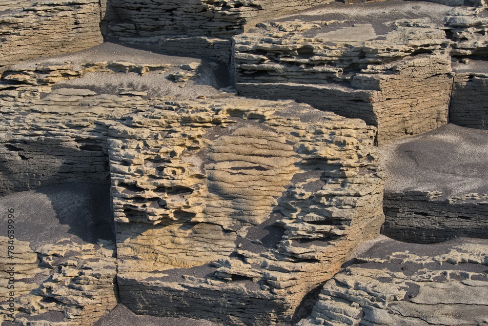 Russia. The Far East. The unique texture of the coastal rocks of Iturup ...