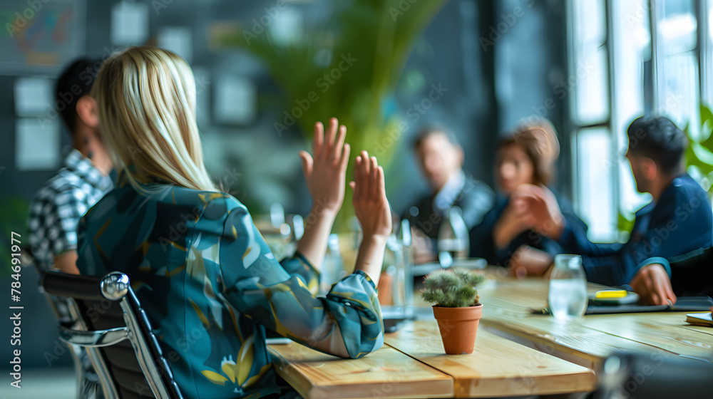 An inclusive team meeting where a sign language interpreter is ...