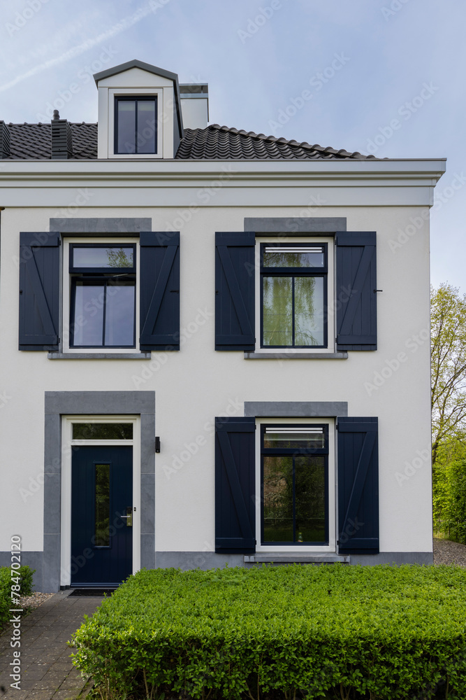 Modern white manor houses in suburban green area Dousberg in Maastricht ...