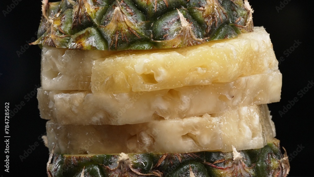 Close up video of fresh pineapple with slice of peel pineapple insert ...