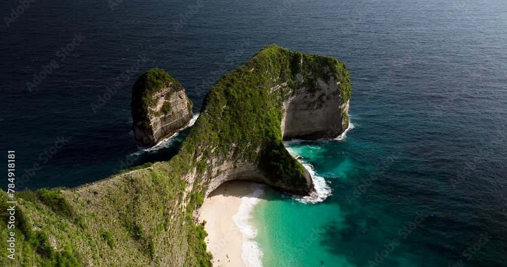 Dramatic limestone cliff that resembles T-Rex dinosaur’s head. Aerial ...