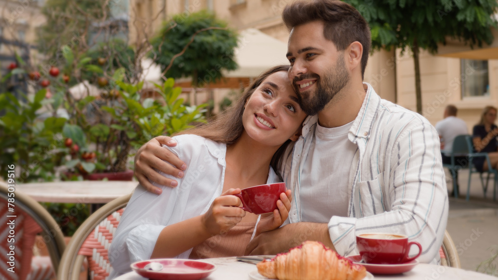 Caucasian happy couple hugging cafe drinking coffee man woman sweet ...