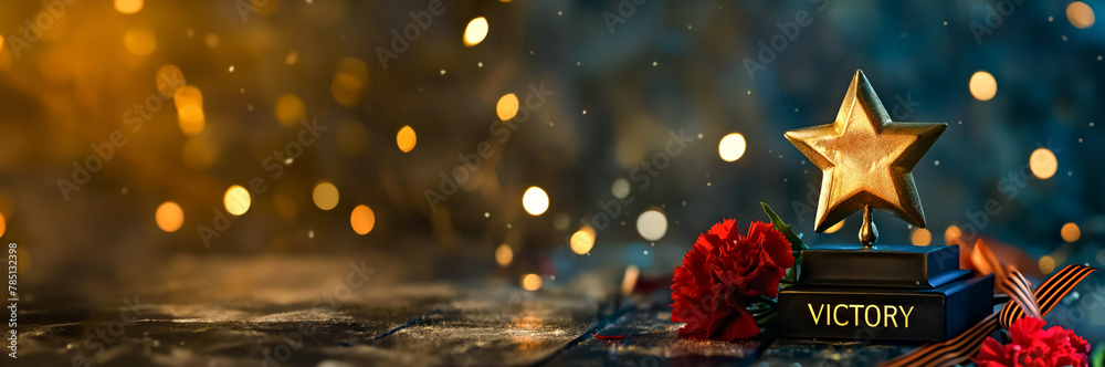 Gold star, word victory written, red carnation and George ribbon ...