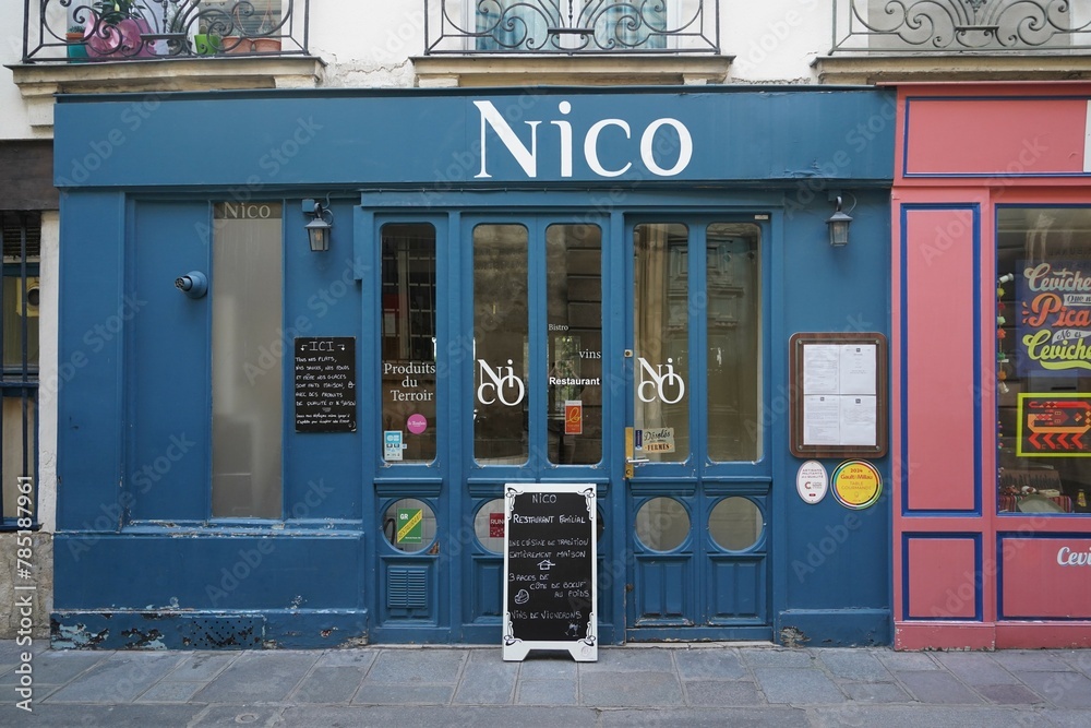 paris , france, 04 04 2024 : typical fancy vintage french storefront ...