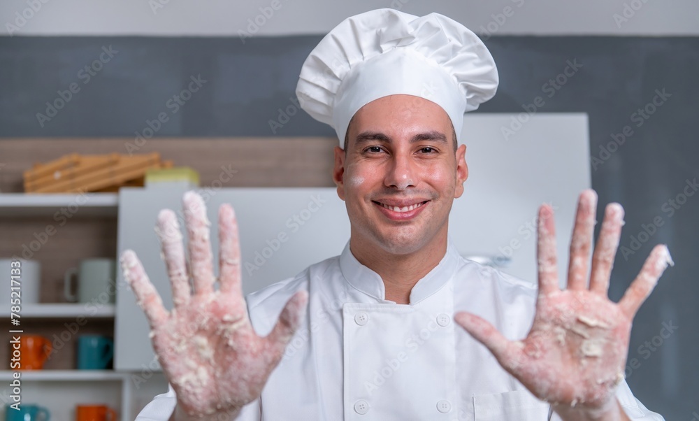 professional Chef sifting flour powder and sprinkling ingredients on ...