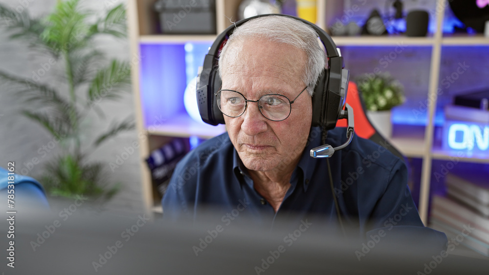Elder streamer alert, serious-faced gaming guru, a mature man with grey ...