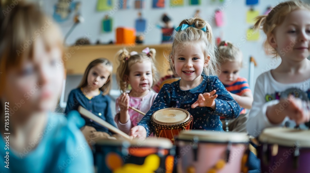 Foto de Dynamic scene of a music class with children playing different ...