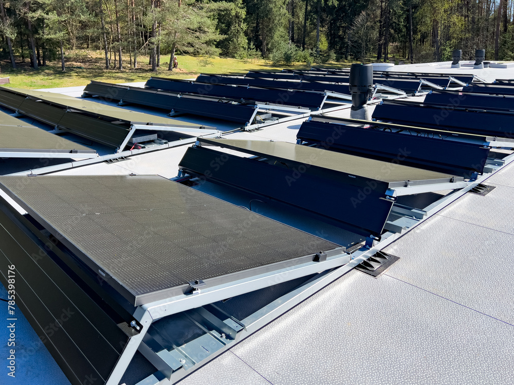 Photovoltaic system. Solar Panels on Flat Roof. Roof Solar Mounting ...