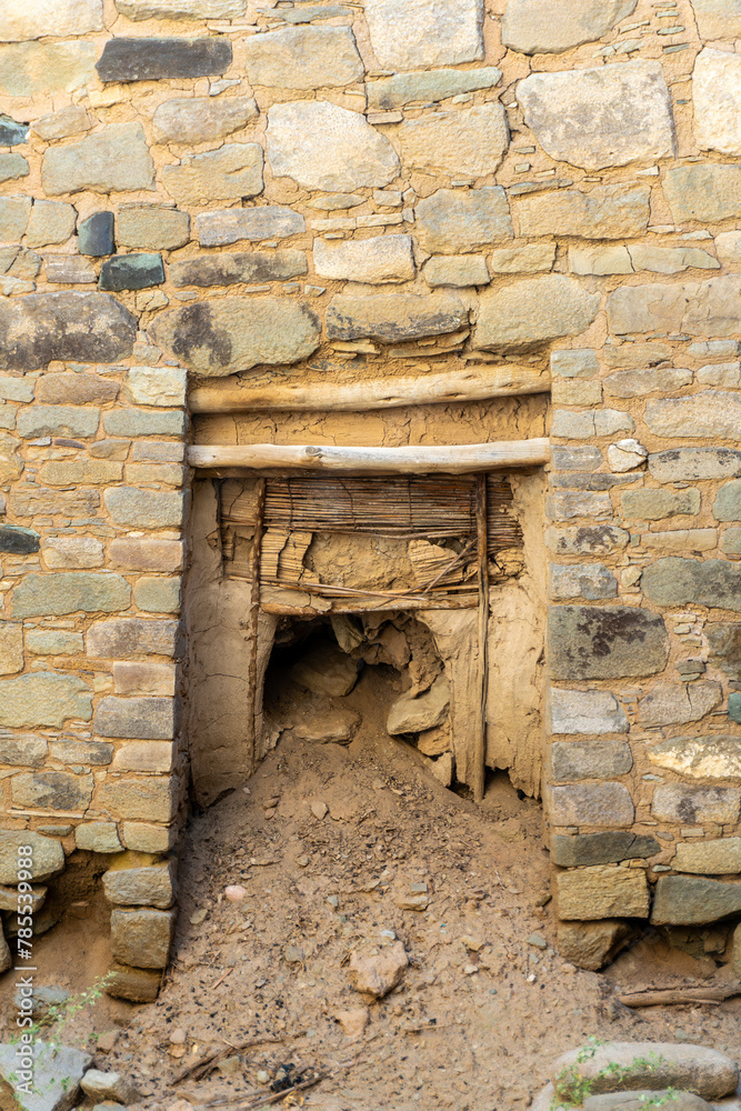 Doorway opening with yucca and willow mat. Aztec Ruins National ...
