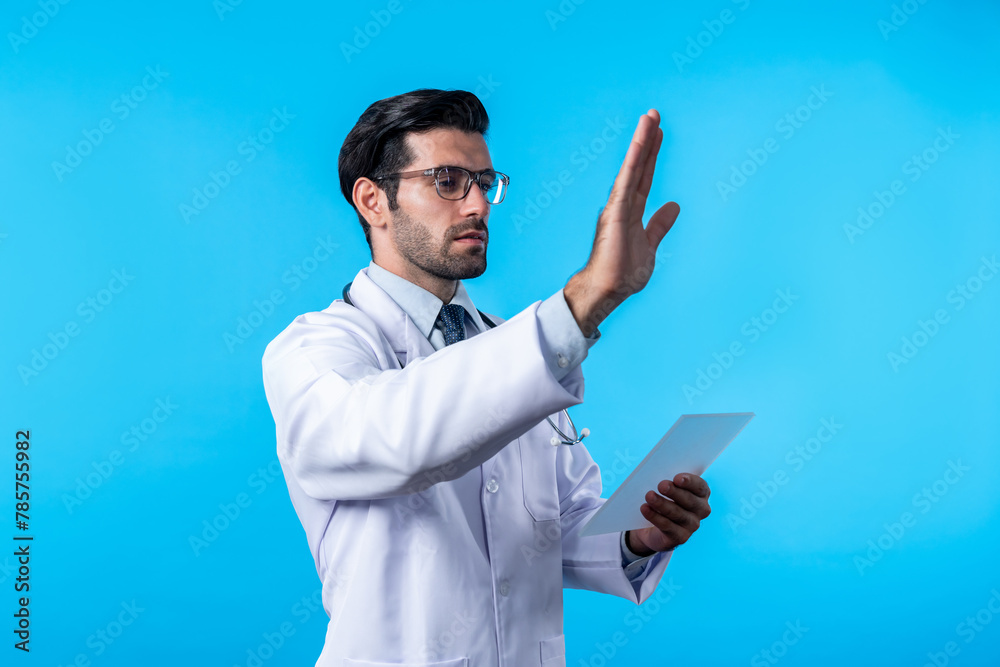 Caucasian smart doctor pointing finger while standing at blue ...