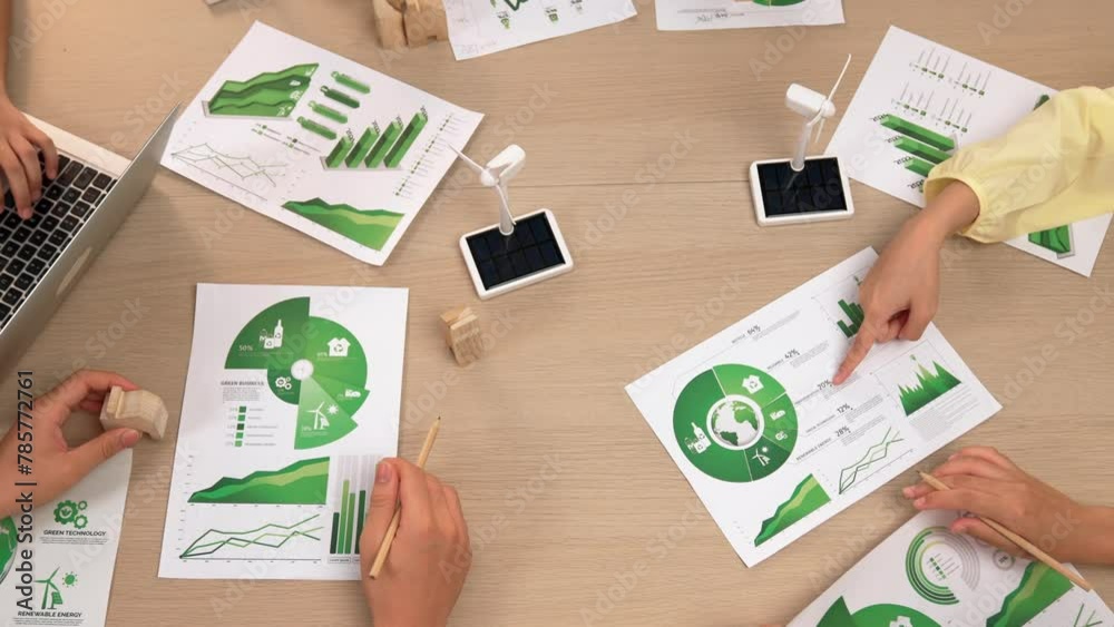 Excellent business team discussing on eco house project at meeting ...