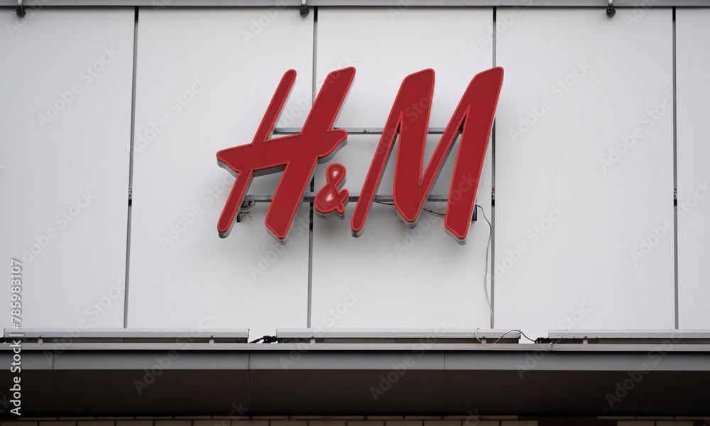 H&M clothing store logo sign. HM Hennes and Mauritz AB, multinational ...