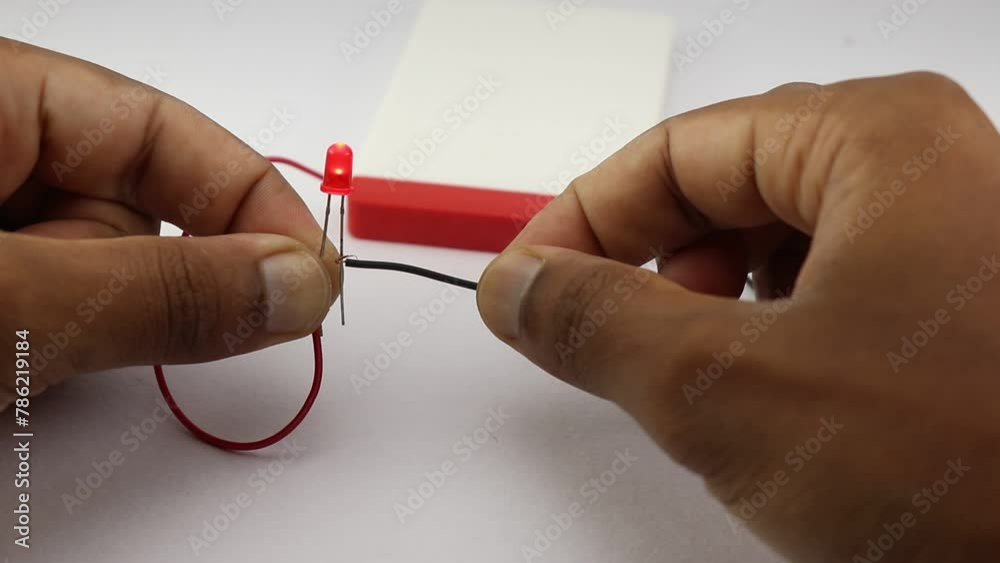 Red color light emitting diode is connected to power source from a ...