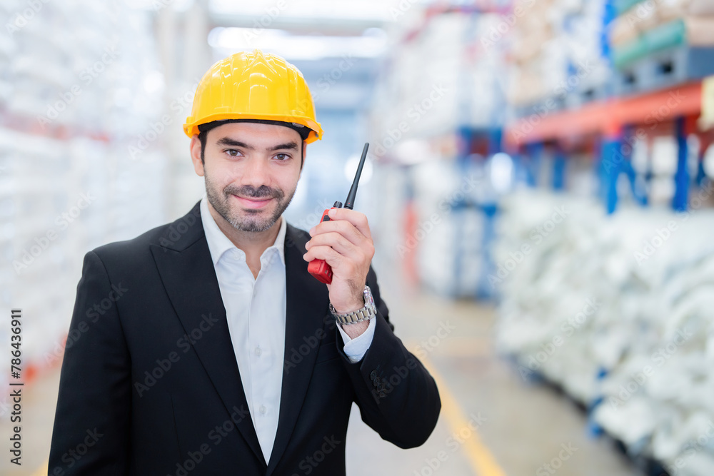 half body photo Factory owner, European male engineer using walkie ...