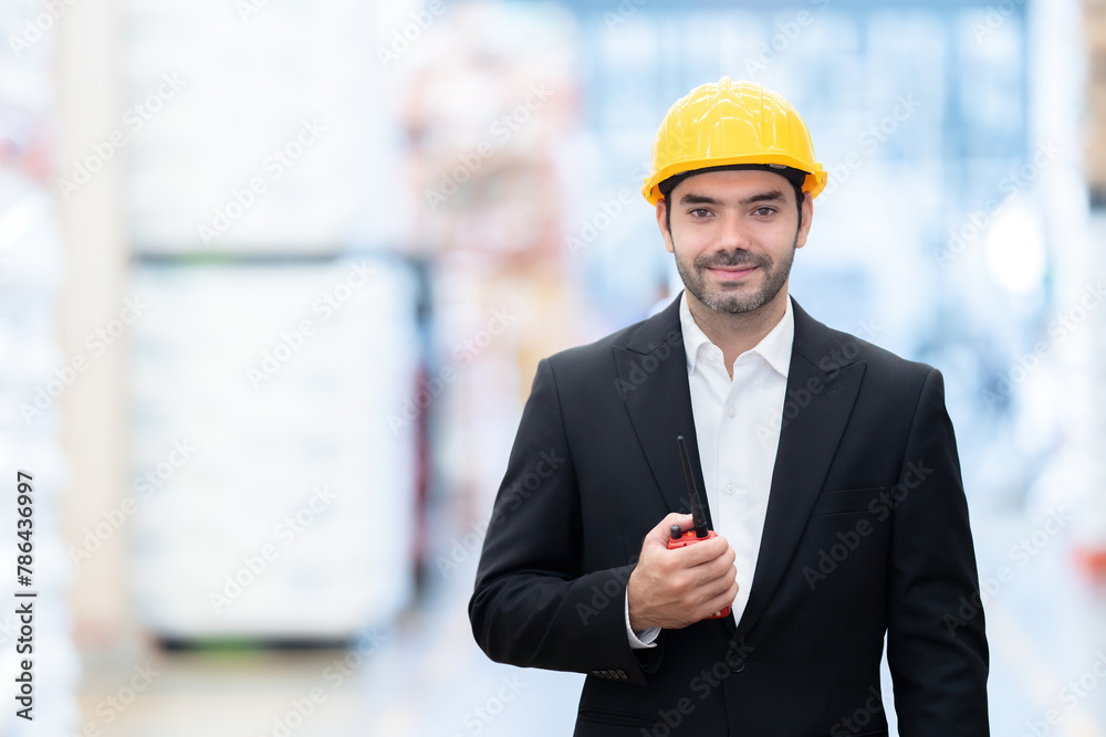 Copy space of a European male engineer supervisor inspecting and ...