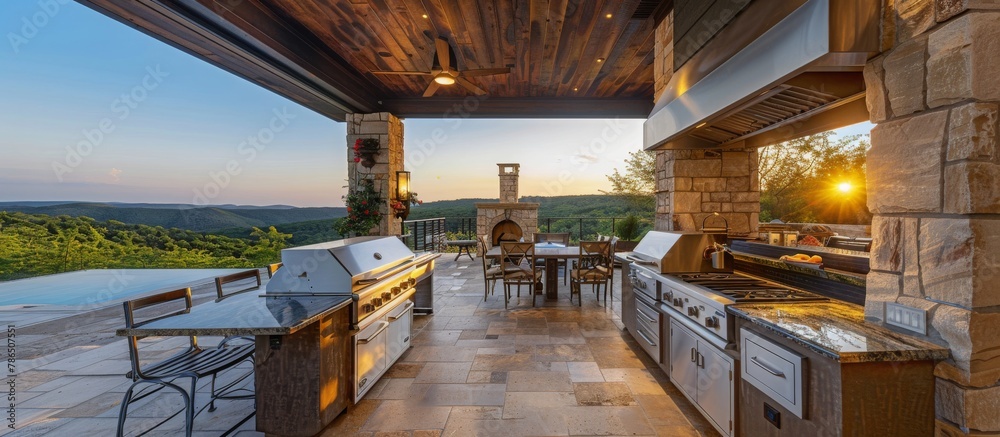 Outdoor kitchen with BBQ grill and dining area is perfect for al fresco ...