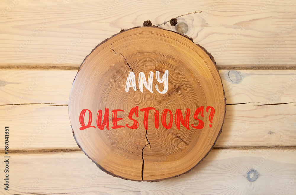 Any questions symbol. Concept words Any questions on beautiful wooden ...